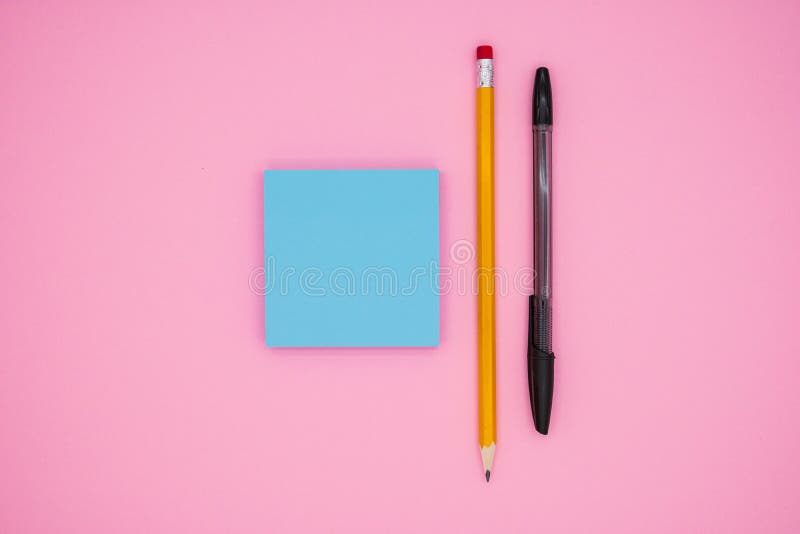 A Long Yellow Pencil and Blue Blank Sticky Notes, on Gray Background ...