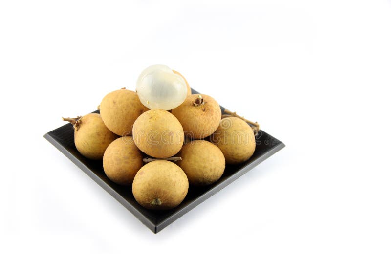 Longan in the black dish. stock image. Image of heap - 32919851