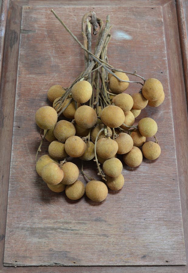 Longan fruit on the wood stock photo. Image of sale, rind - 51865286