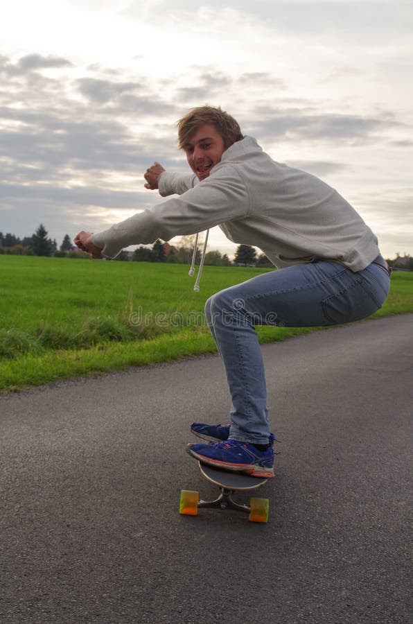 Longboarder Trying To Keep Balance Stock Image - Image of contest ...
