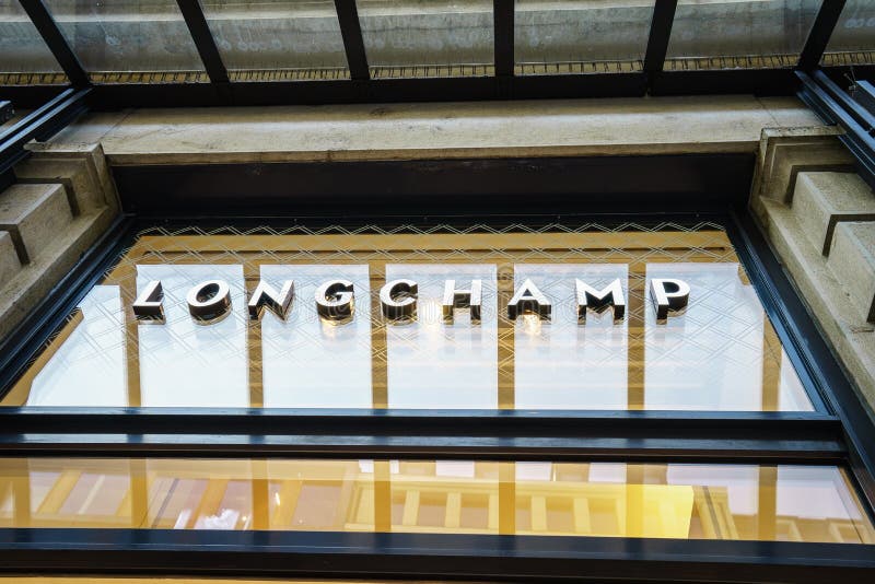 Longchamp-Logo redaktionelles foto. Bild von trainer - 45354516