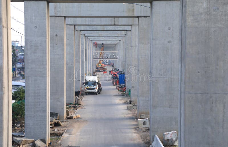 Look through the Cement Pillars with Long Distance Construction. Stock ...