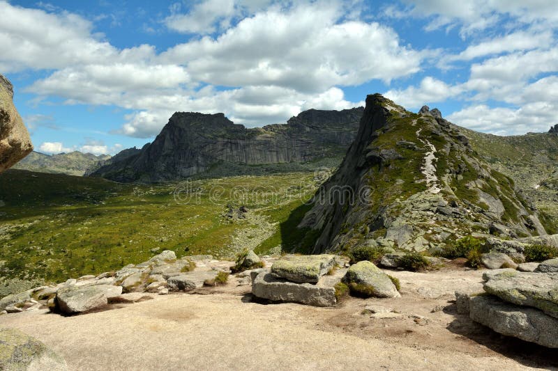 A Look from a Flat Stone at a Path Going Along a Steep Slope of a ...