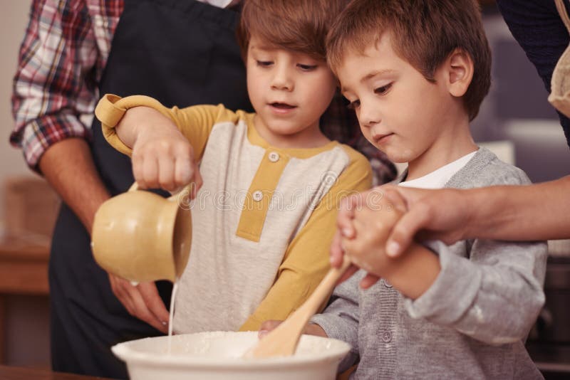 Look at How Great Im Doing. Two Young Brothers Baking in the Kitchen ...