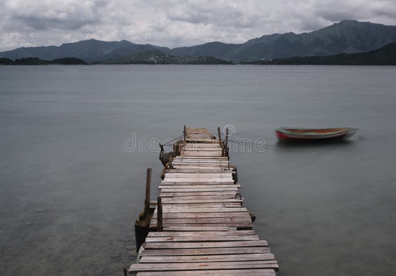 Pier and boat stock image. Image of morning, mist, dream - 12346181