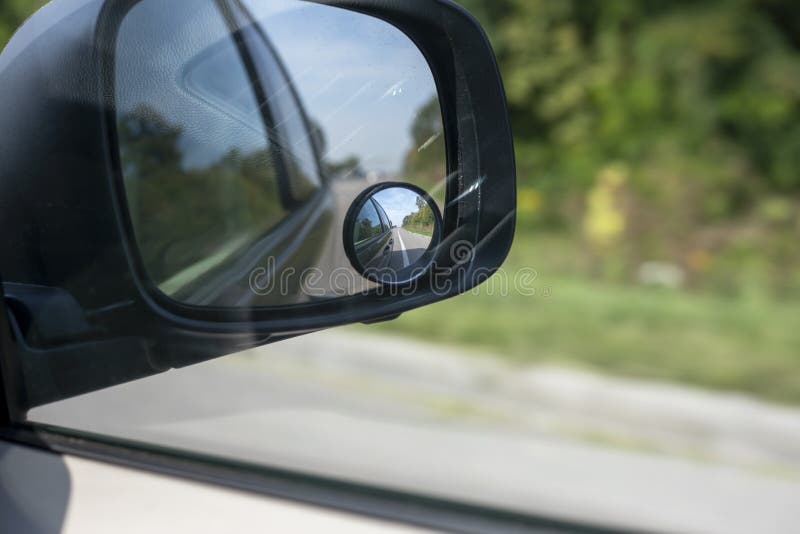 Look at the Road from the Windshield with Two Mirrors during the Day ...