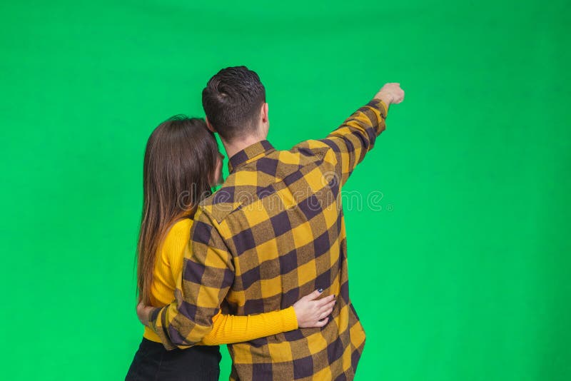Couple pointing far away stock image. Image of casual - 28805845