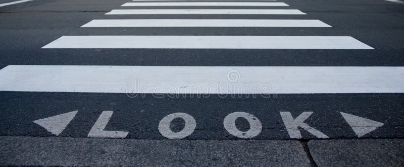 Look Text with Zebra Crossing Path on a Road Stock Photo - Image of ...