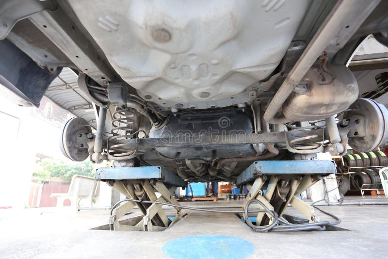 Look Under the Car at Inspection for Maintenance. Stock Image - Image ...