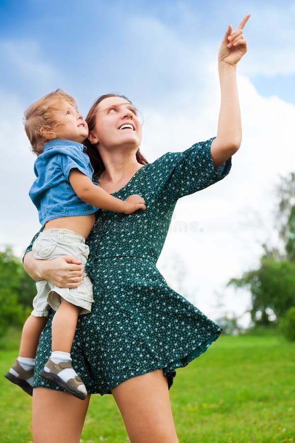 Look who s there? stock image. Image of grass, preschooler - 26899309