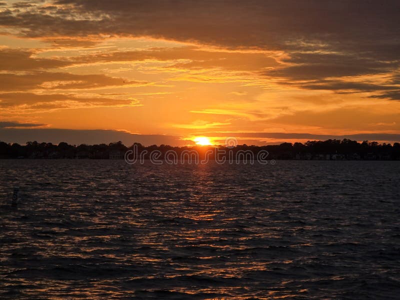 A distant sunset stock photo. Image of dawn, plain, sunrise - 260507236