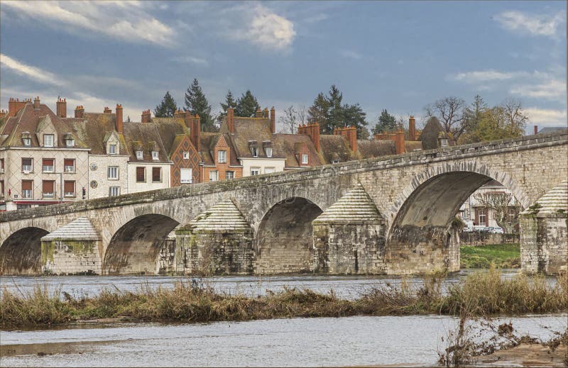 Looking Across a River at a Ancient Bridge and Town Stock Photo - Image ...