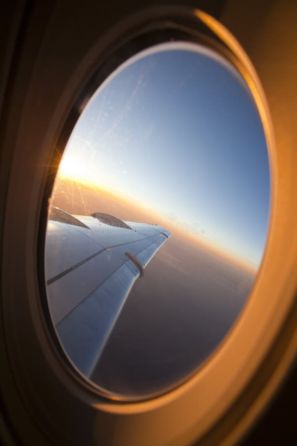 Looking Through Airplane Window At Sunset Stock Photo - Image of ...