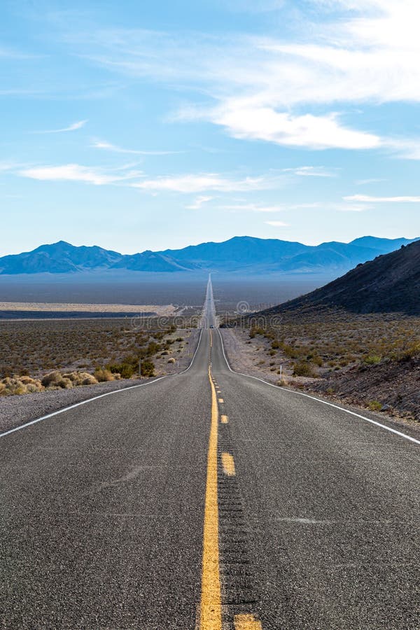 Looking Along a Long Straight Road on the Way To Death Valley Stock ...