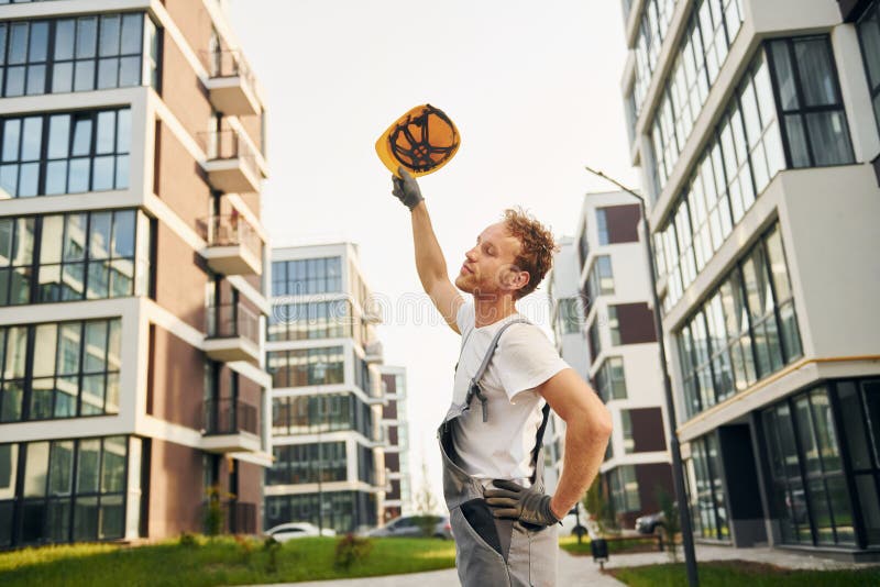 Looking Buildings Young Man Working Uniform Construction Daytime Stock ...