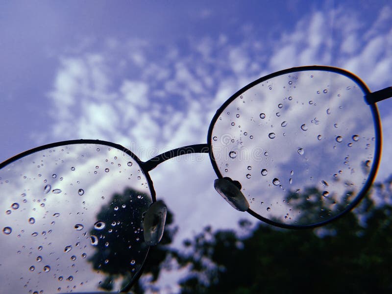 Looking at the Clear Afternoon Sky after the Rain through the Glasses ...