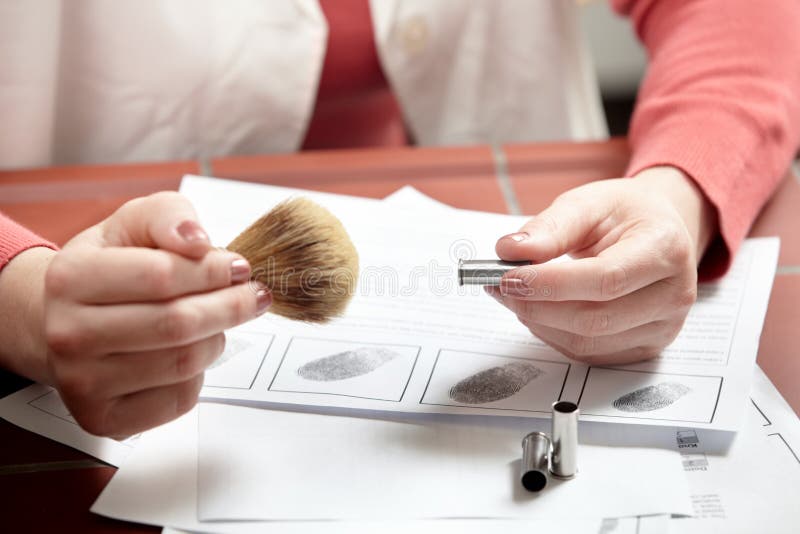 Looking for Clues...a Forensic Scientist at Work with a Brush and Print ...