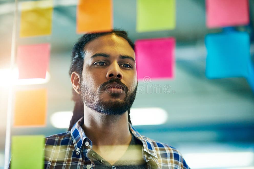 Looking at Creativity Logically. a Young Man Having a Brainstorming ...
