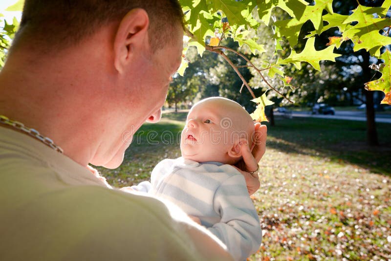 Looking at Daddy stock image. Image of blue, child, daddy - 35526801
