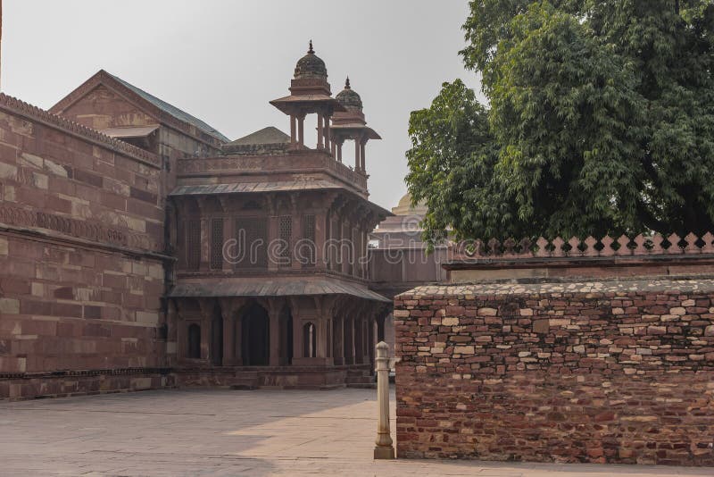 Looking Down an Alleyway at an Ancient Red Stone Building Stock Image ...