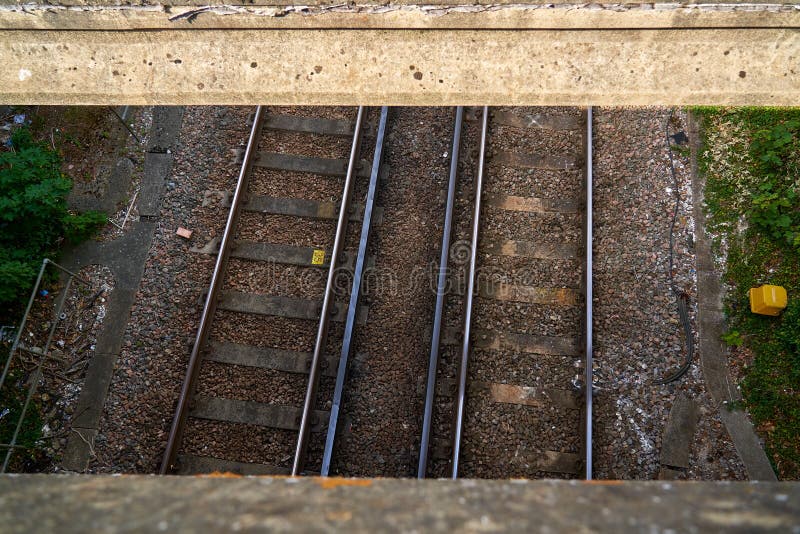 Looking Down through a Bridge on a Pair of Train Lines Below Stock ...