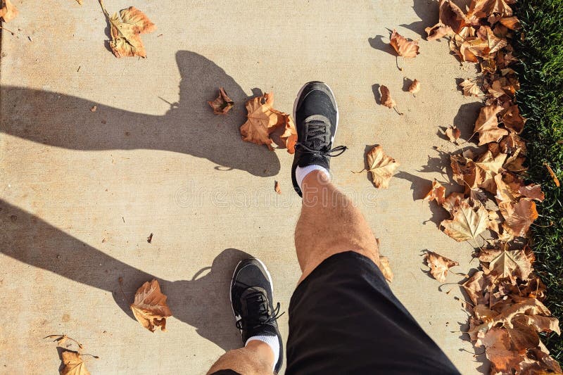 Looking Down at Feet while Walking for Exercise Stock Image - Image of ...
