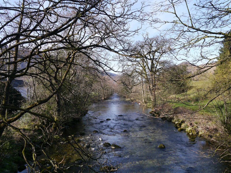 Looking Down River in Spring Stock Photo - Image of fence, brown: 86324418