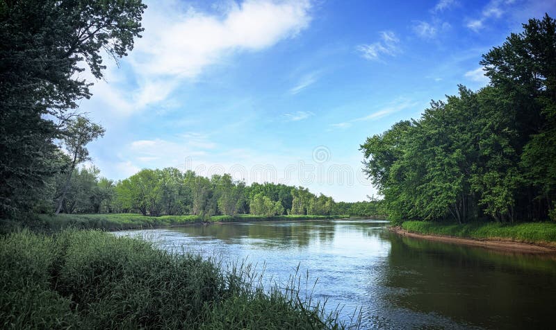 Looking Down the River, Watching the Clouds Drift by Stock Image ...