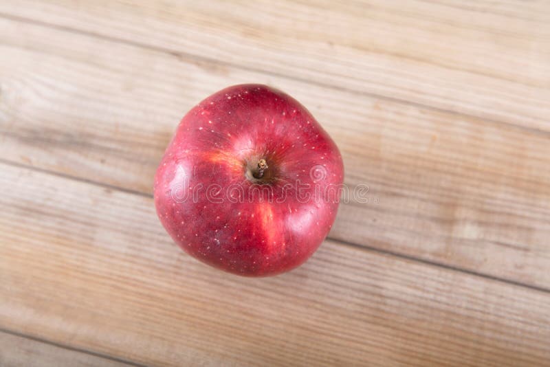Looking Down and Shooting a Red Apple on the Table Stock Photo - Image ...