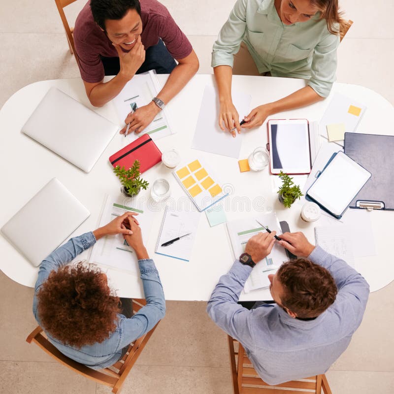 Looking Down on Success. High Angle Shot of a Group of Businesspeople ...
