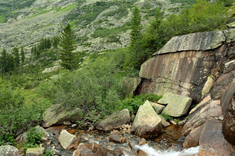 Looking Down from the Top of a Rocky Slope of a Low Cliff with a ...