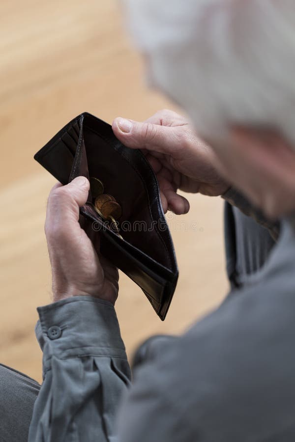 Looking at an empty wallet stock photo. Image of gray - 54858264