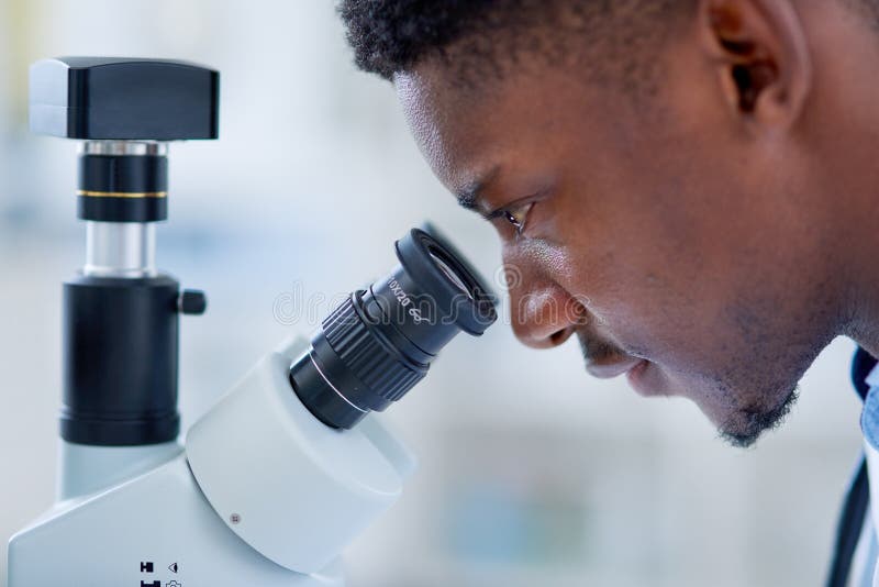 Looking through the Eyes of the Lens. a Focused Young Male Scientist ...