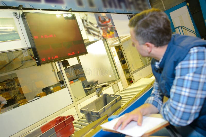 Looking at factory screen stock photo. Image of transaction - 82958888