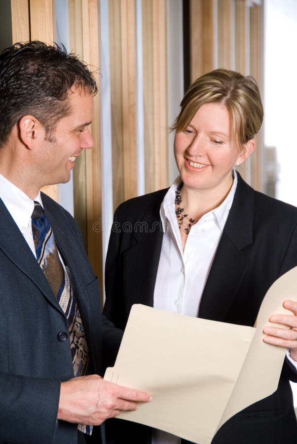 Looking at files stock image. Image of colleagues, businesswoman - 2228855