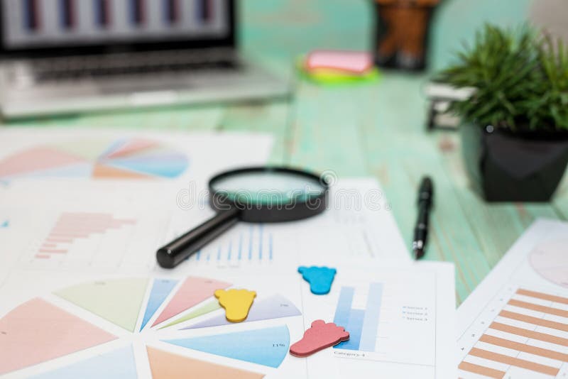 Looking at Growth Chart with Magnifying Glass. Graphs, Charts an Stock ...