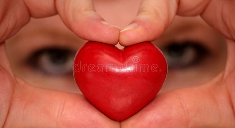 Looking through Hands Forming Heart Stock Image - Image of hearts ...