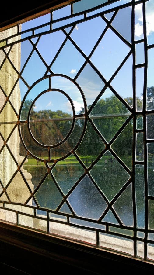 Looking through Lead Paned Window Stock Photo - Image of dreams ...