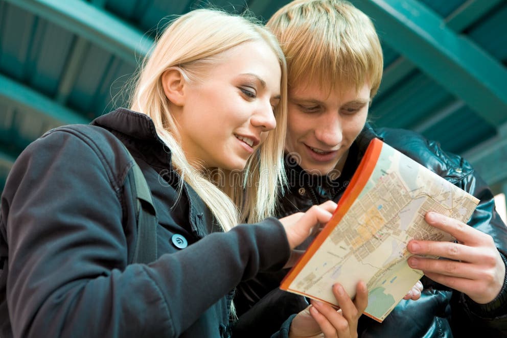 Looking at map stock image. Image of consulting, amorous - 10944079