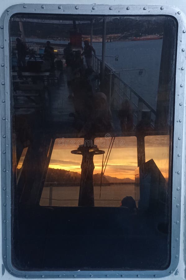 Looking in the Mirror while on the Ship Stock Image - Image of glass ...