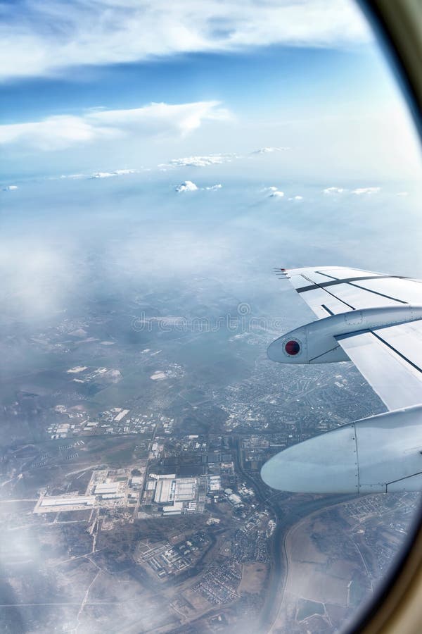 Boy Looking Out Jet Window stock image. Image of child - 2914929