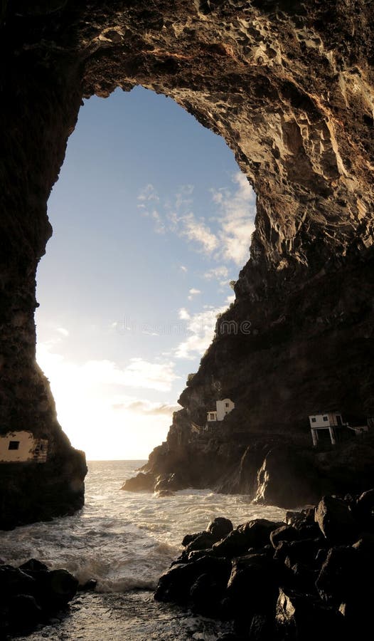 Looking Out through a Cave stock image. Image of water - 243528667