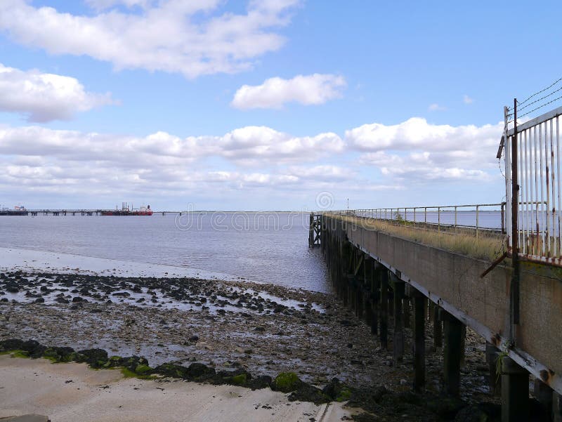 Looking Out from Shoreline by Derelict Jetty Stock Photo - Image of ...