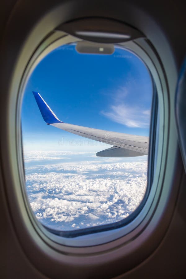 Looking Out the Window of Airplane, Sky with White Clouds Viewed from ...