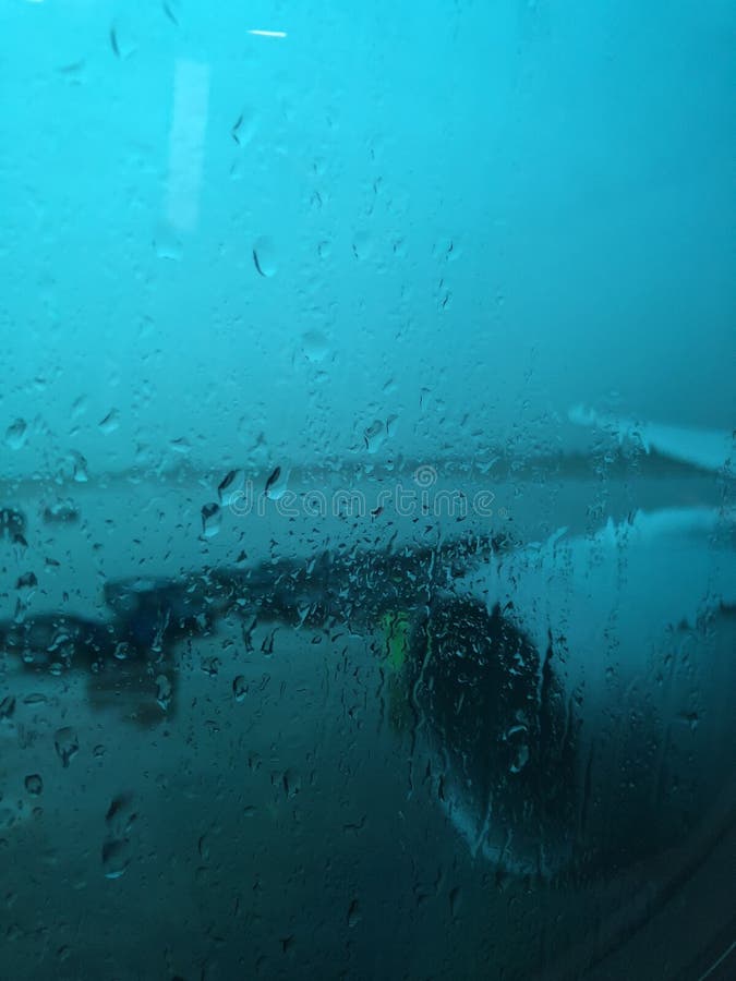 Looking Out a Window on a Rainy Day Stock Image - Image of baggage ...