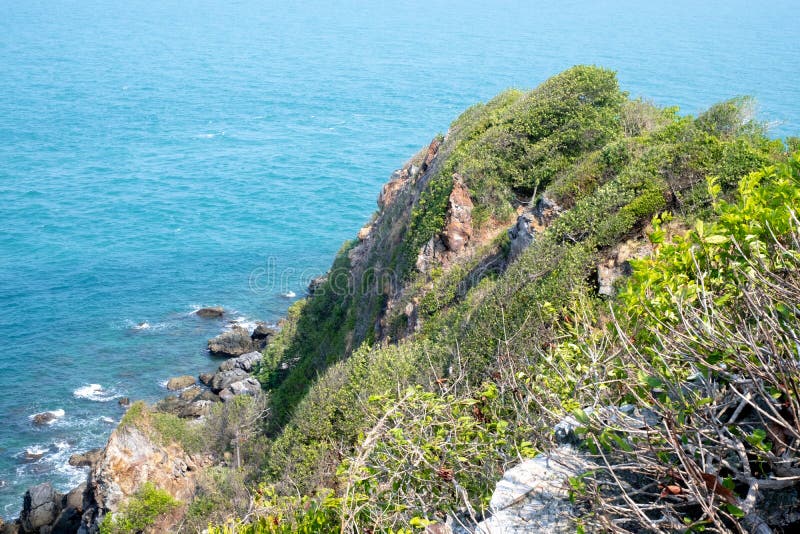 Looking Over a Cliff Edge with Blue Sea Below and Cliff Edge and the ...