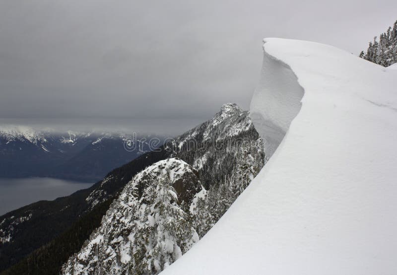 Looking over the Edge stock image. Image of snowy, adventure - 67164595