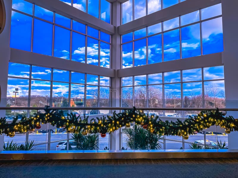 Looking at a Partly Cloudy Beautiful Blue Sky through a Row of Long ...