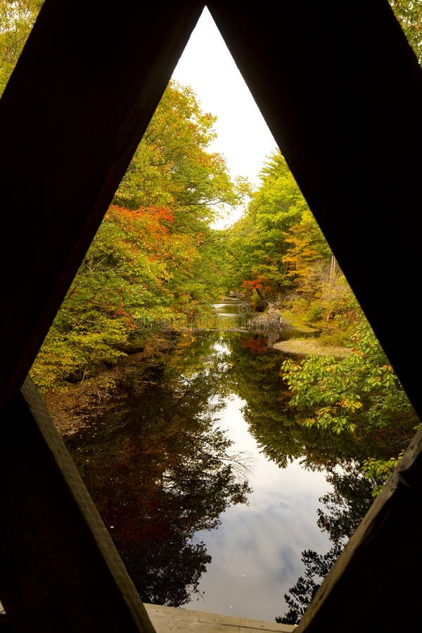 Inside Keniston Covered Bridge in New Hampshire, with Fall Colors Stock ...