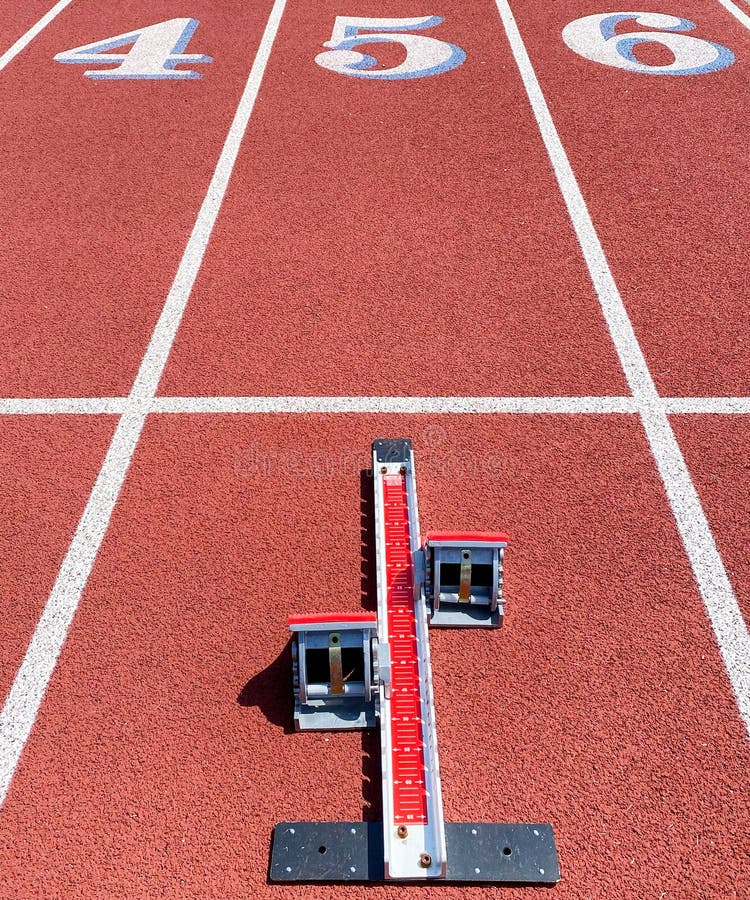 Looking at Runners Starting Blocks in Lane Five on a Red Track Stock ...